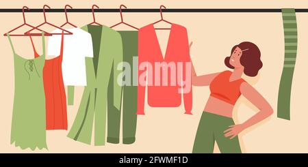 Girl trying on dress in clothing store. Shopping. Woman buys a ...