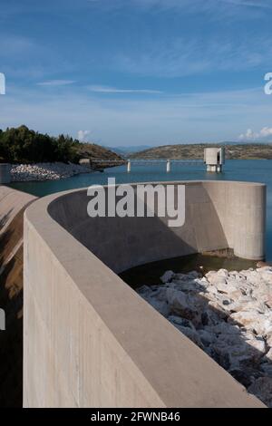Large concrete reservoir dam wall in sunshine, Barrage dam and Lac de ...