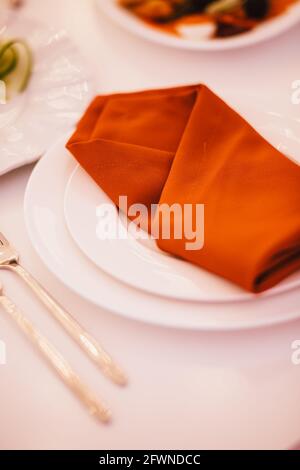 Fabric napkin for table setting on white background Stock Photo - Alamy