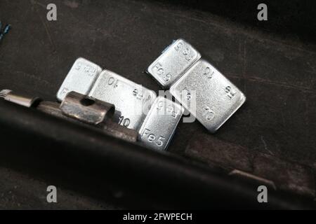 Kuwait City – Kuwait – April 15, 2021: Lead weight ingots for wheel ...