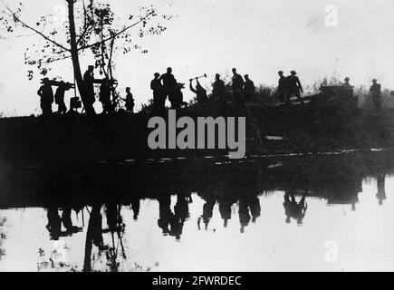 American engineers constructing a pontoon bridge in St. Mihiel, France ...