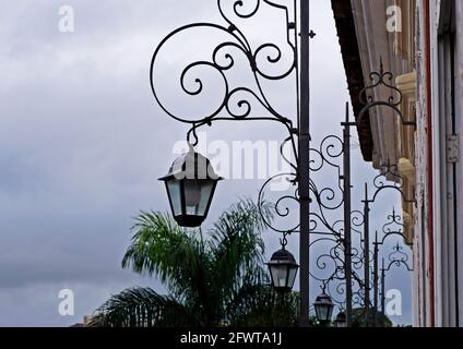 Colonial lantern and iron volutes in Sao Joao del Rei, Brazil Stock ...