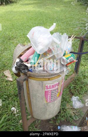 The dustbin with natural background Stock Photo - Alamy