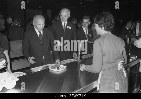 PVDA congress in Groningen. During lunch Joop den Uyl with behind him ...