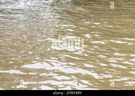 Reflections dirty water from the canal background Stock Photo - Alamy