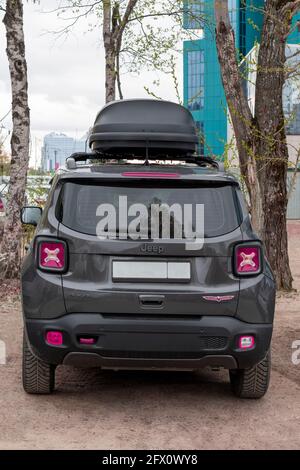 SUV car with roof rack luggage container for off road travelling parked ...