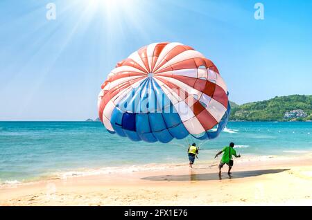 Parasailing with sky at Patong Beach in Phuket - Thailand extreme ...
