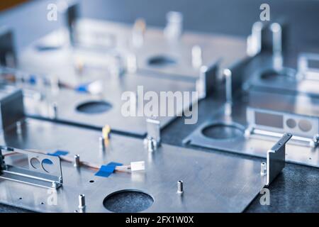 Metal boards and accessories lie on the surface Stock Photo - Alamy