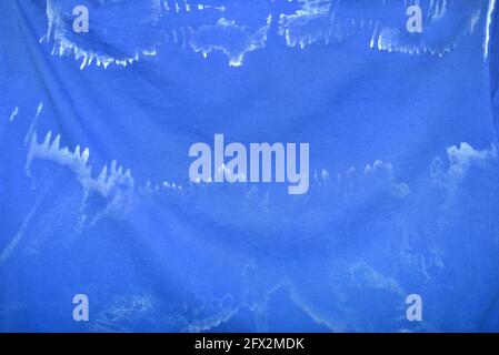 White salty sweat stains on blue clothes Stock Photo - Alamy