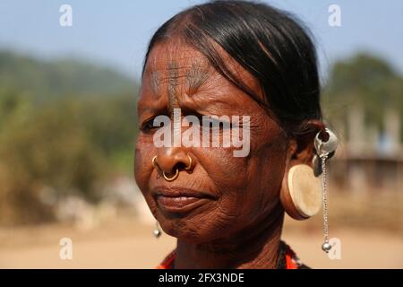 Sora tribal woman in a rural village near Gunupur in Odisha, India ...
