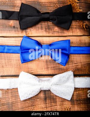 Male clothes, accessories and business magazine on green background ...