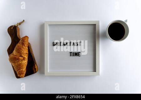Letterboard With Words That Spell Breakfast Time, with a cup of coffee ...