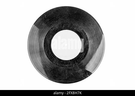 Damaged black vinyl record album cover on white background with ...