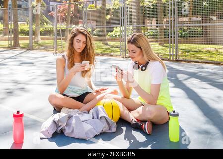 Women using mobile phones Stock Photo - Alamy