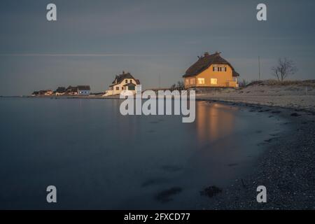 Germany, Schleswig-Holstein, Heiligenhafen, Beachside villas standing ...
