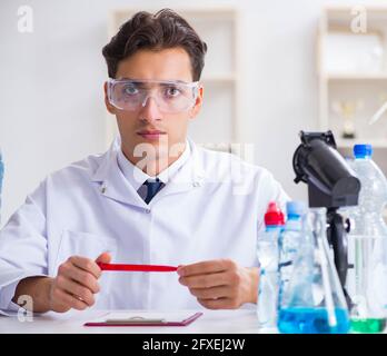 Lab assistant testing water quality Stock Photo - Alamy
