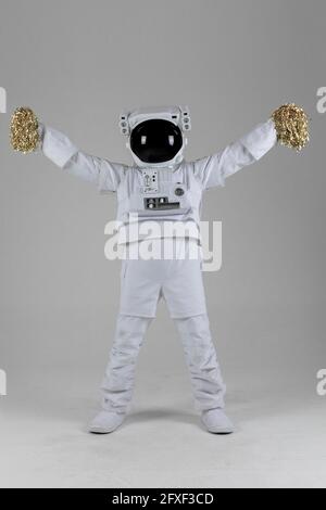 astronaut with cheer pompom, white background Stock Photo - Alamy