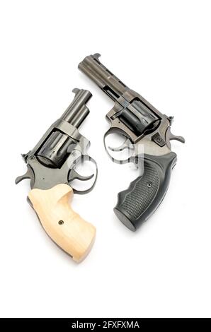 two revolvers with gun drums isolated on white Stock Photo - Alamy