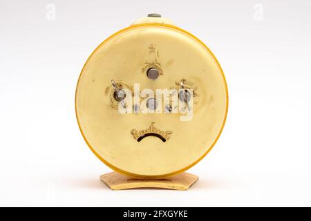 Back of an old mechanical alarm clock Stock Photo - Alamy