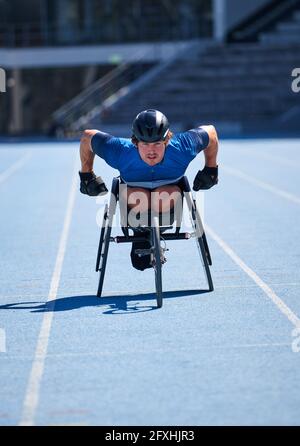 Male Wheelchair Athlete Training on Red Running Track at Outdoor ...