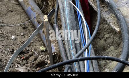 electric cables installed in the ground Stock Photo - Alamy