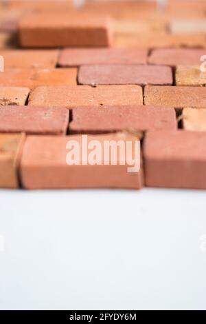 Closeup of a background with some red bricks making a wall texture ...