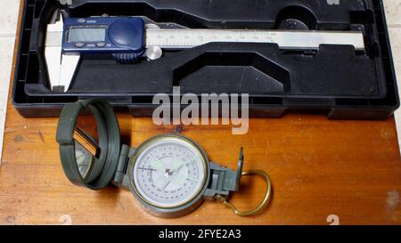 Old nautical compass caliper Stock Photo - Alamy