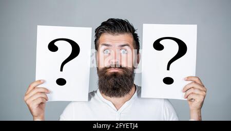 Paper notes with question marks. Beard man question mark in head ...