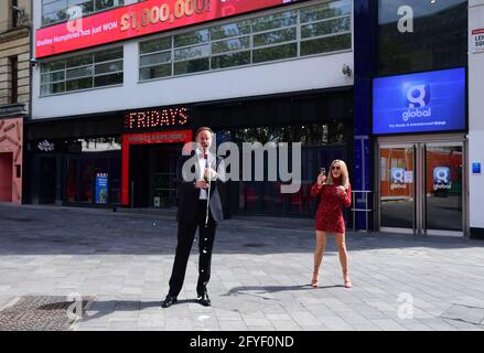 Heart radio presenters Amanda Holden and Jamie Theakston celebrate the ...