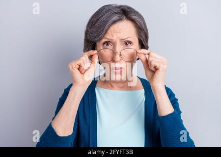 Photo of adorable impressed girl dressed blue top rising bargains ...