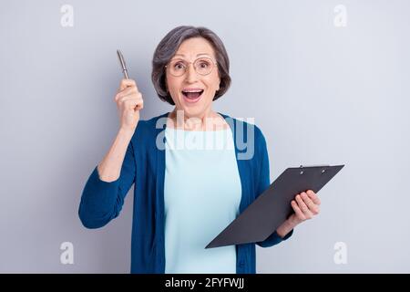 Photo of crazy amazed woman pointing index finger at herself, impressed ...