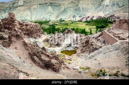 Ruins at Basgo Monastery with stones , rocks and a pond Stock Photo - Alamy