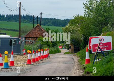 country lane closed to traffic with concrete bollards Stock Photo - Alamy