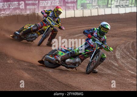 Luke Harrison (Red) leads Max James in the first running of the 250cc ...