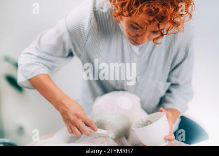 Spirulina anti-aging clay face mask beauty treatment Stock Photo - Alamy
