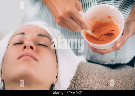 Peel off facial mask treatment Stock Photo - Alamy