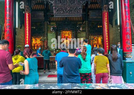 Spring lively atmosphere at temple to pray with pilgrims for peace as ...
