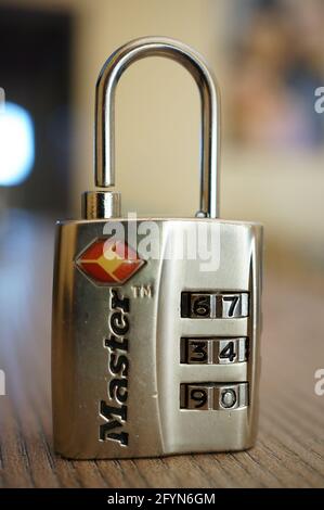 POZNAN, POLAND - Apr 23, 2015: A closeup of a coin on a wooden table ...