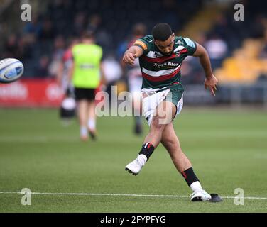 Leicester Tigers' Zack Henry kicks clear under pressure from Wasps ...