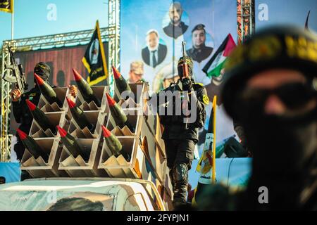 Palestinian fighters of Al-Quds brigades, the military wing of ...