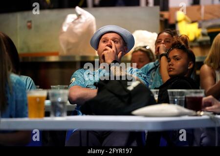 Manchester City fans react at the Mary Ds Pub during the UEFA Champions ...