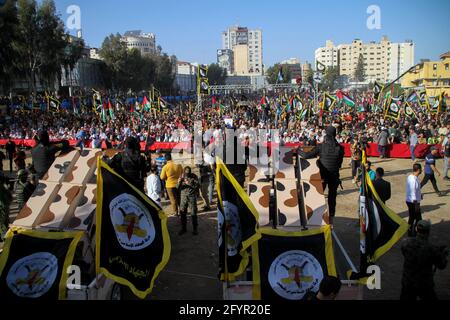 Armed masked fighters of Al-Quds Brigades, the military wing of Islamic ...