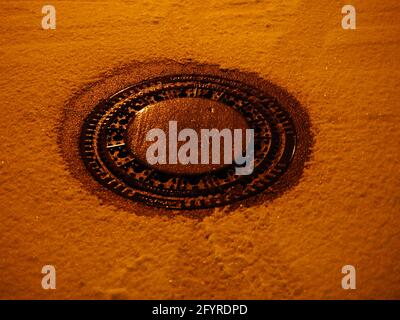 Street lighting manhole cover in Los Angeles. High voltage electricity ...