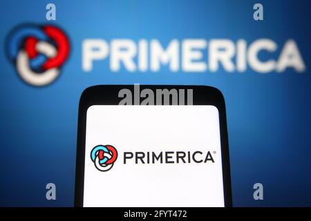 In this photo illustration, Primerica logo seen on a smartphone and a ...