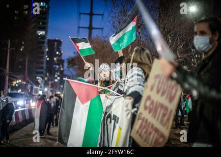 Members of the Palestinian community in Chile attend a caravan to ...