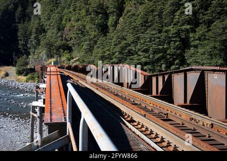 Railway bridge over river, Arthurs Pass, Canterbury, South Island, New ...
