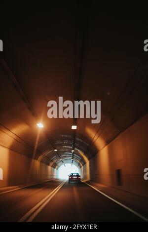 A vertical shot of a bridge tunnel of a road Stock Photo - Alamy