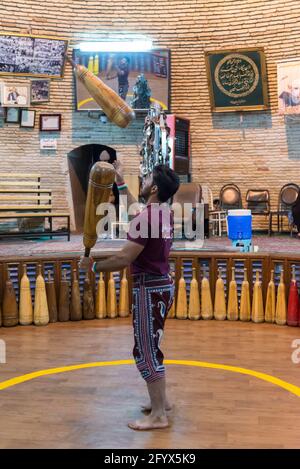 wooden clubs in traditional Persian gym called zurkaneh in Yazd city ...