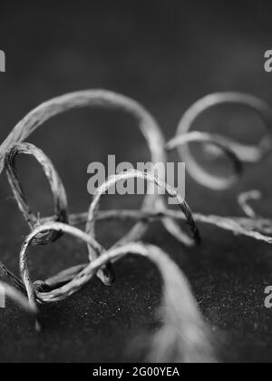 Industrial concept. On the black surface are gears, a pen and a ...