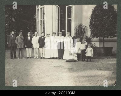 Group portrait of the Kessler family. In the middle, Mrs. Kessler is ...